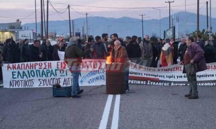 Έκλεισαν την παλαιά εθνική οδό Αθηνών – Πατρών οι αγρότες - LarissaPress